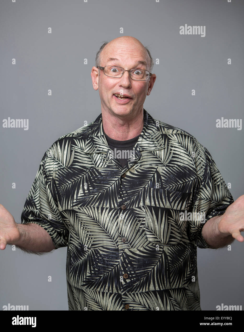 Older Caucasian man shrugging Stock Photo - Alamy