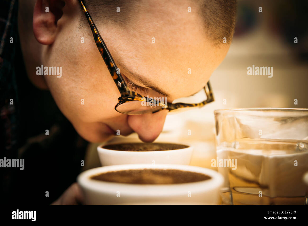 Young caucasian man smelling hi-res stock photography and images - Alamy