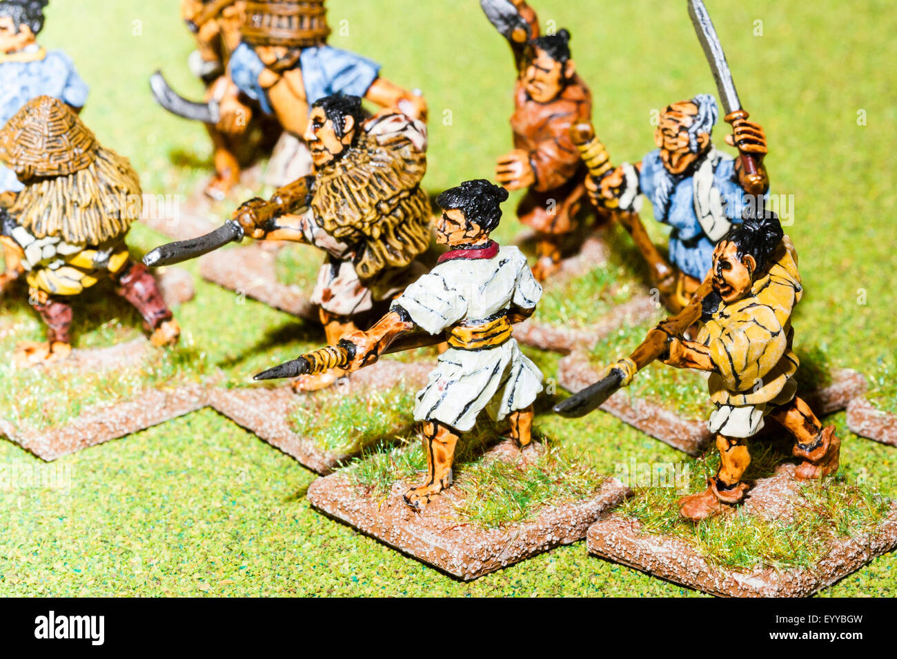 Close-up of metal painted model war gaming figures. Warrior monks and ...