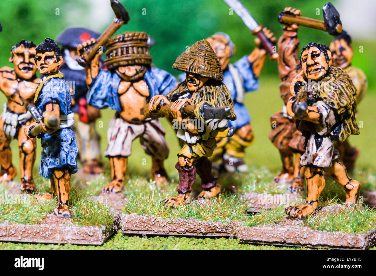 Close-up of metal painted model war gaming figures. Warrior monks and ...