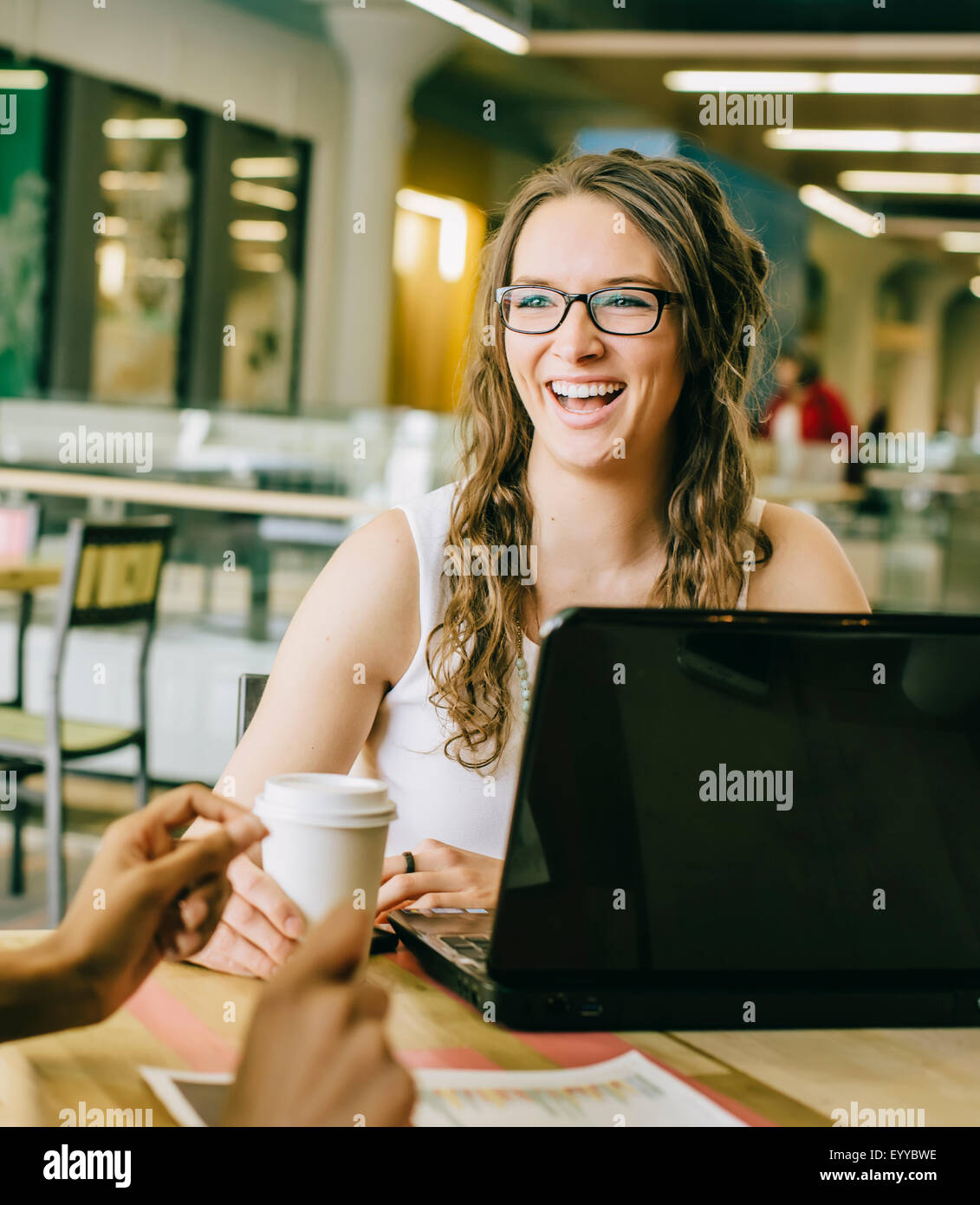 Business people working together in cafe Stock Photo - Alamy