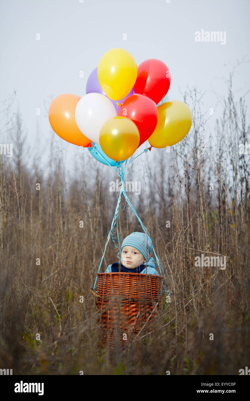 little boy wants to fly on balloons Stock Photo - Alamy little boy wants to fly on balloons Stock Photo - Alamy