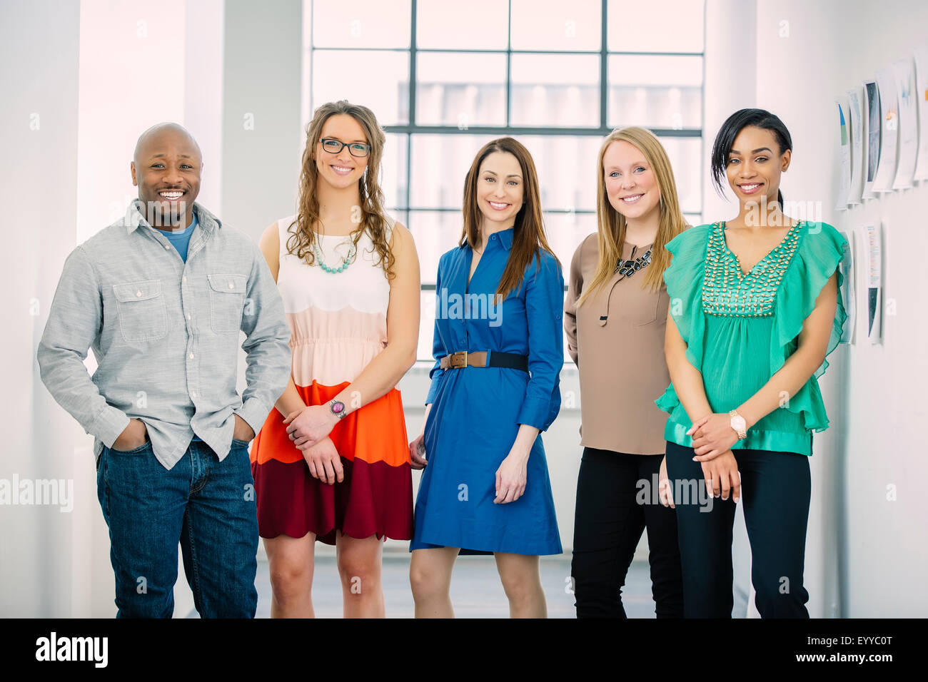 Business people smiling in office Stock Photo - Alamy