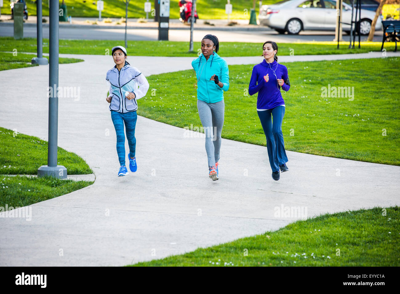 Women running in park Stock Photo - Alamy