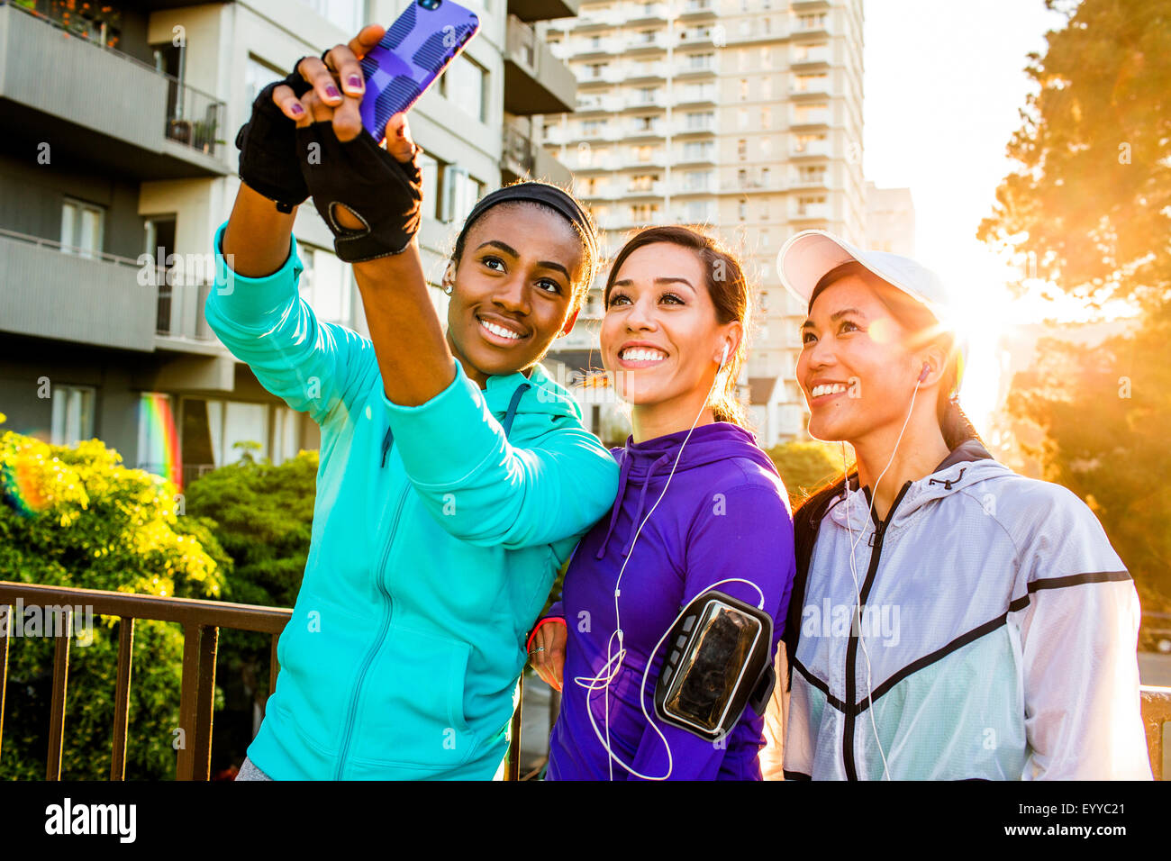Runners taking selfie in city Stock Photo - Alamy