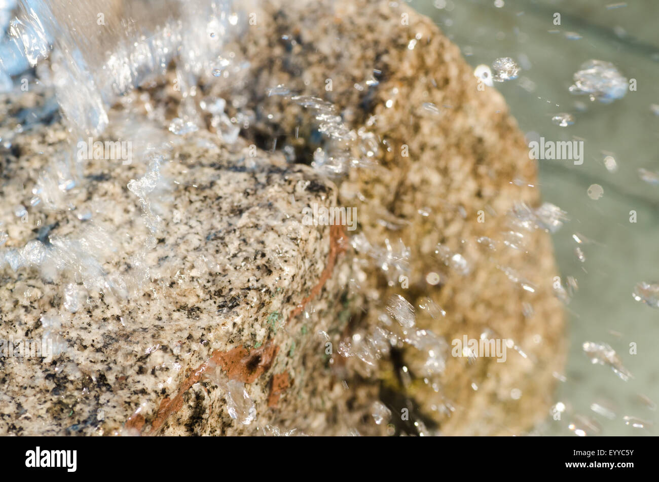 closeup to water splash on stone Stock Photo - Alamy