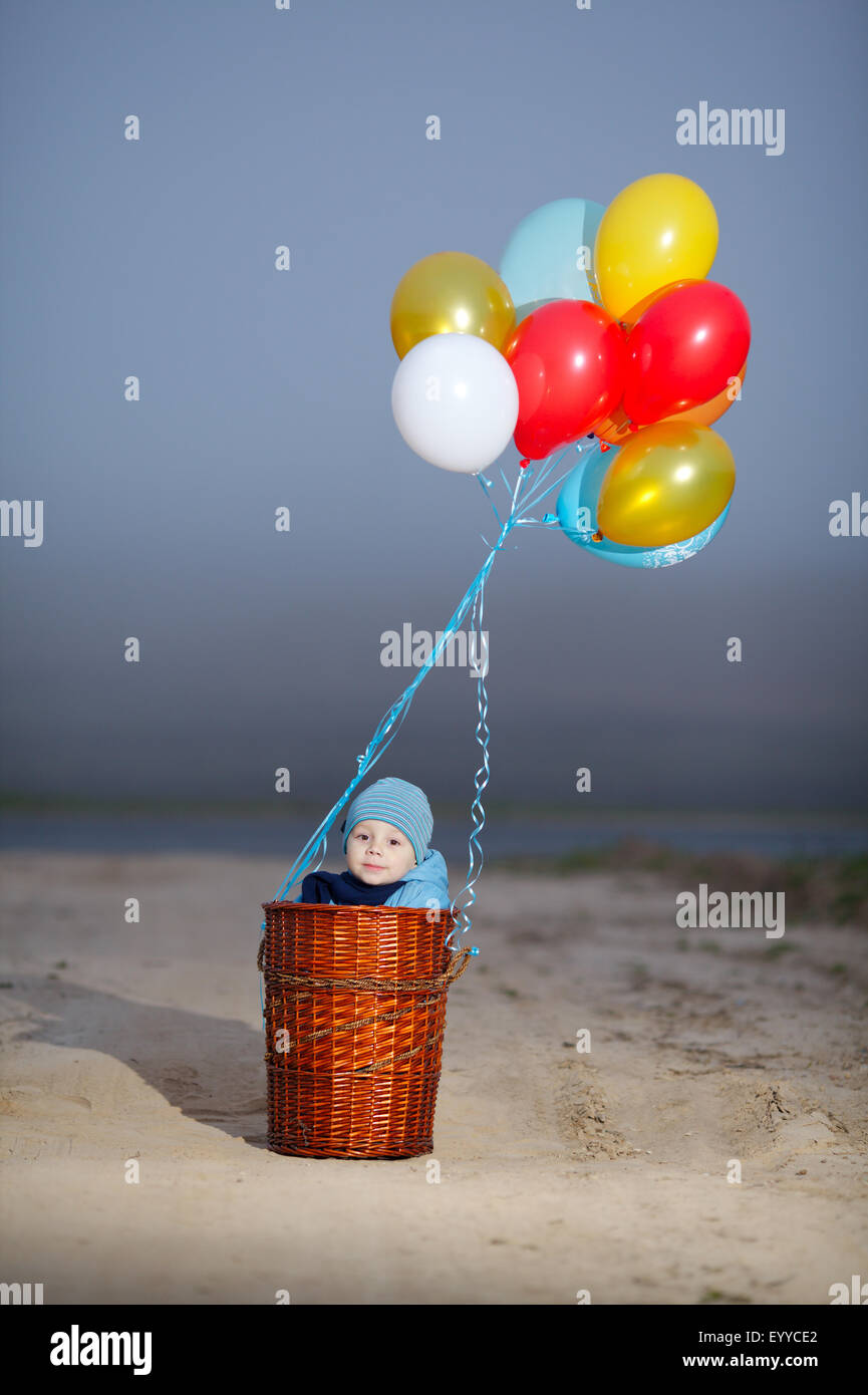 little boy wants to fly on balloons Stock Photo - Alamy little boy wants to fly on balloons Stock Photo - Alamy