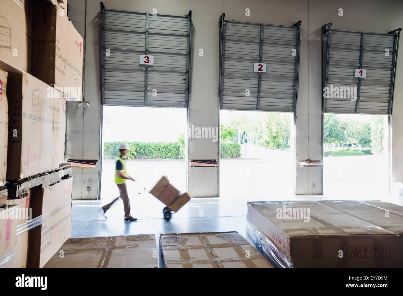 Worker walking warehouse hi-res stock photography and images - Alamy