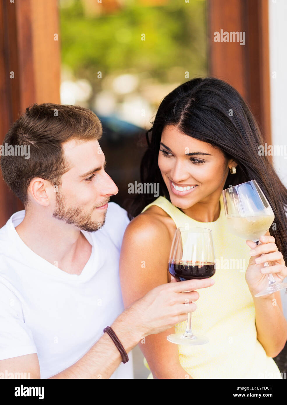 Hispanic couple drinking wine Stock Photo - Alamy
