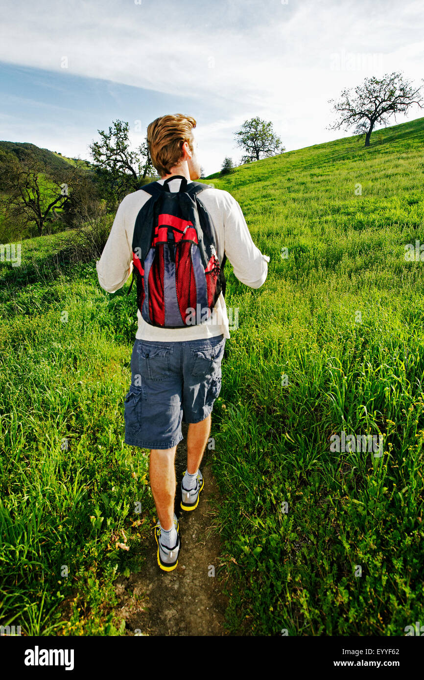 Man walking countryside back view hi-res stock photography and images ...