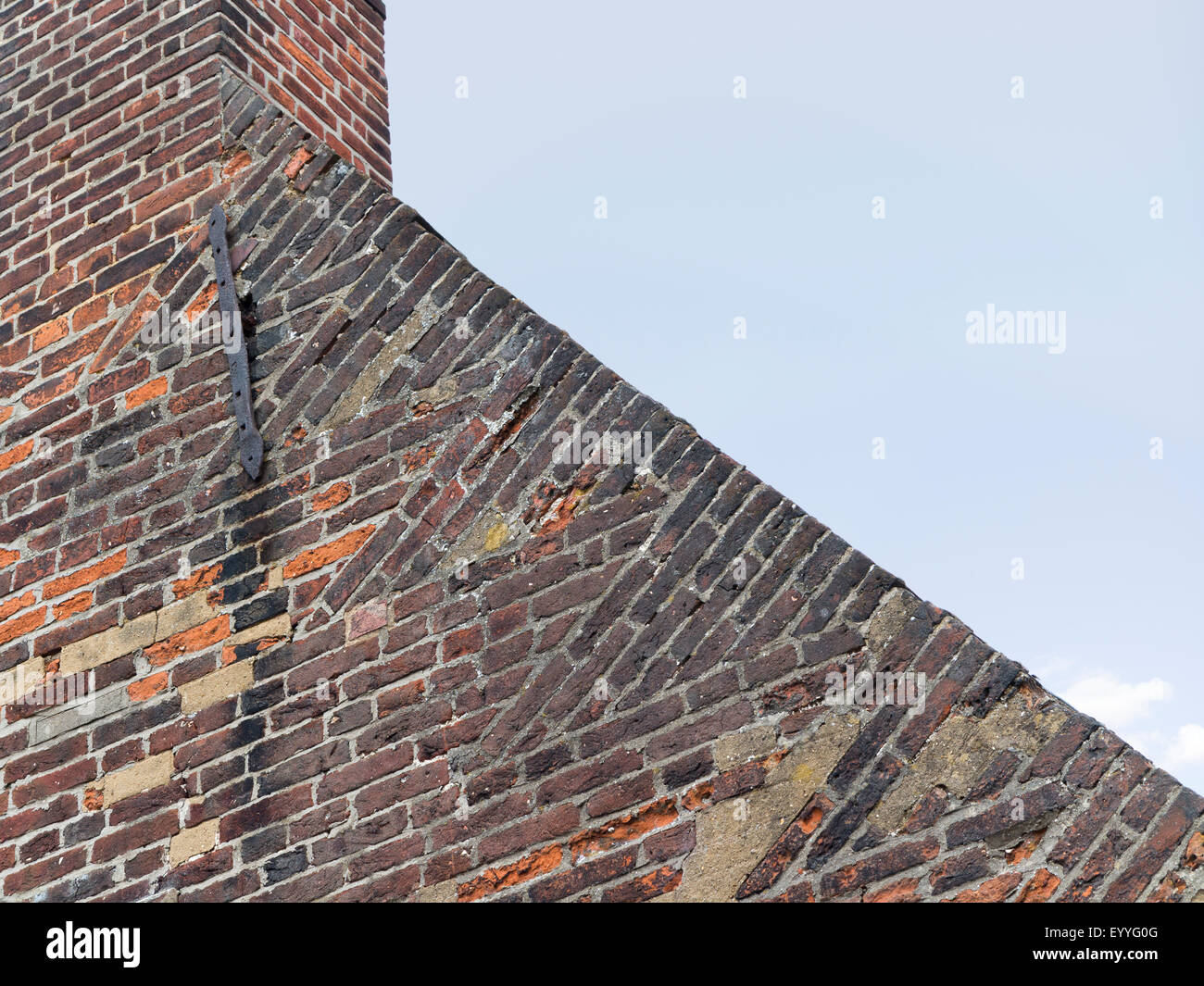 Vernacular brick construction of house with gable end showing complex ...