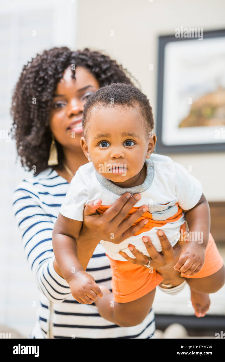 Bonding childhood close up holding standing hi-res stock photography ...