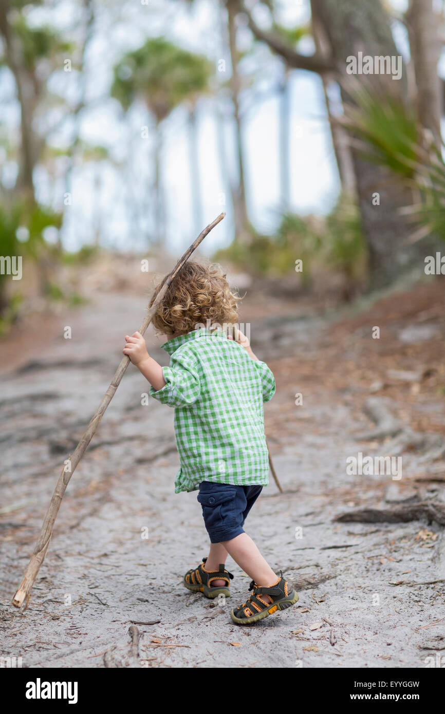 Caucasian baby boy walking on dirt path Stock Photo - Alamy
