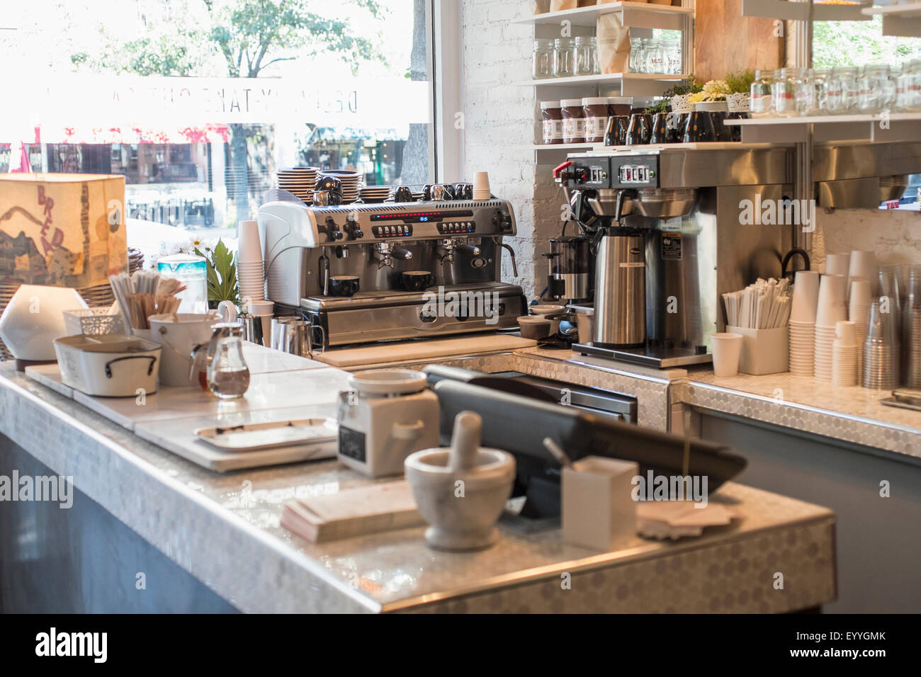 Empty counter and coffee makers in cafe Stock Photo - Alamy