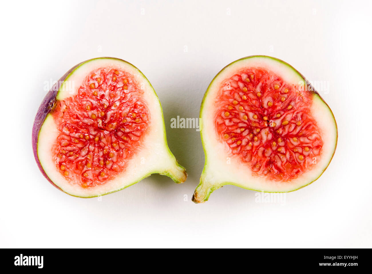 fig (Ficus carica), halved fig, cut-out Stock Photo - Alamy
