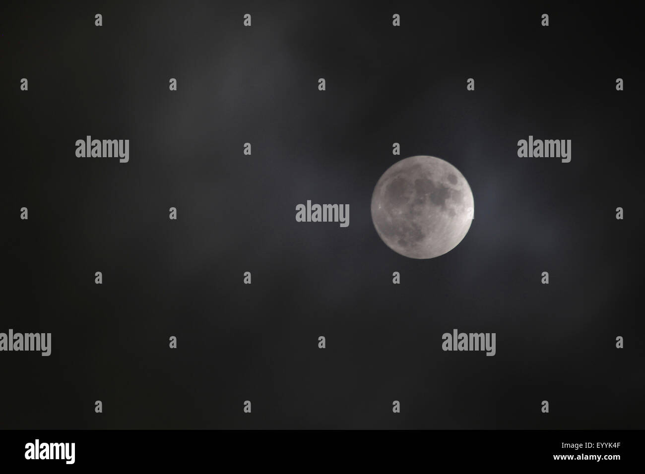 Moon through clouds hi-res stock photography and images - Alamy