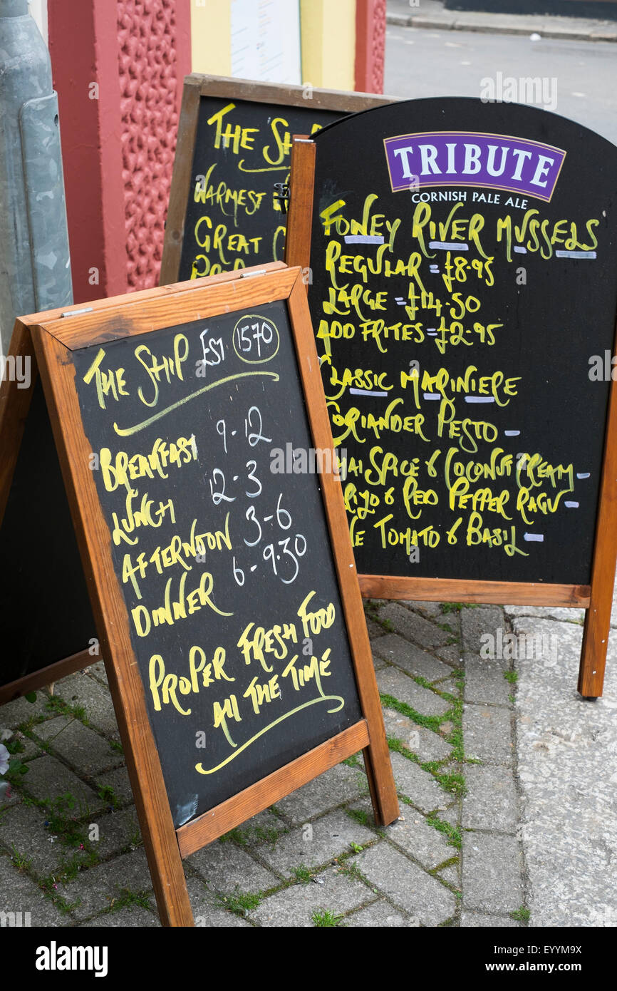 Menu boards outside the Ship Inn at Fowey, Cornwall, England, UK Stock ...