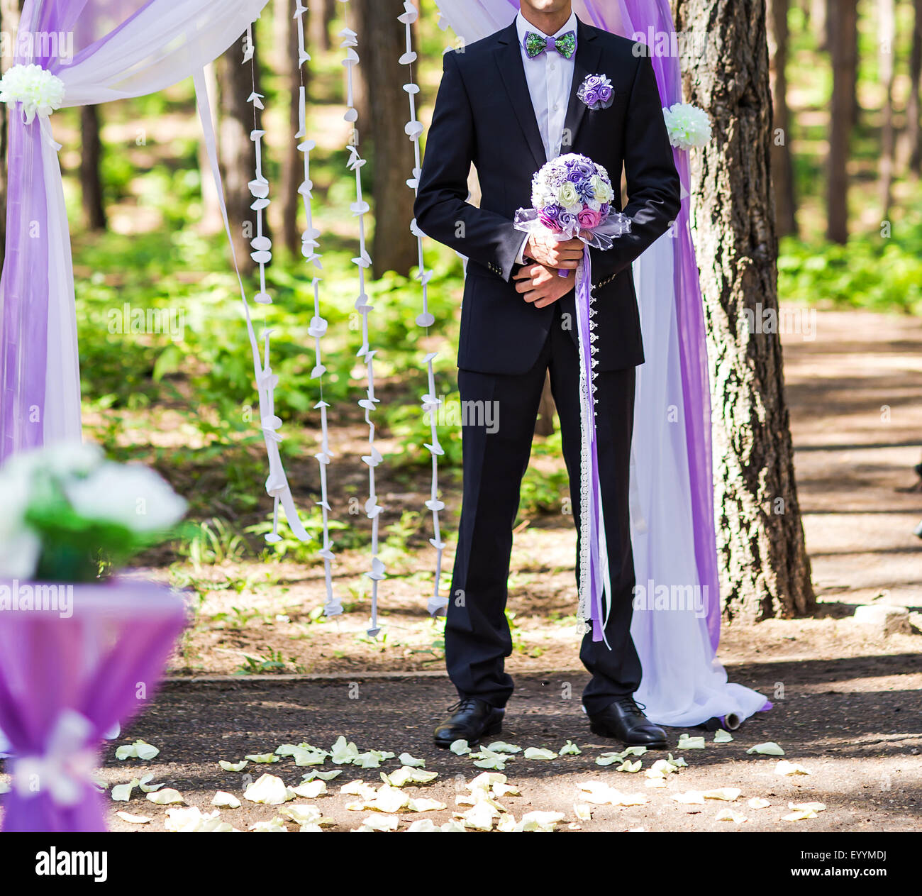 Groom waiting for the bride to come Stock Photo - Alamy