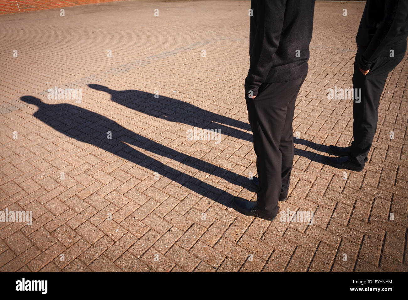 Two long shadows hi-res stock photography and images - Alamy