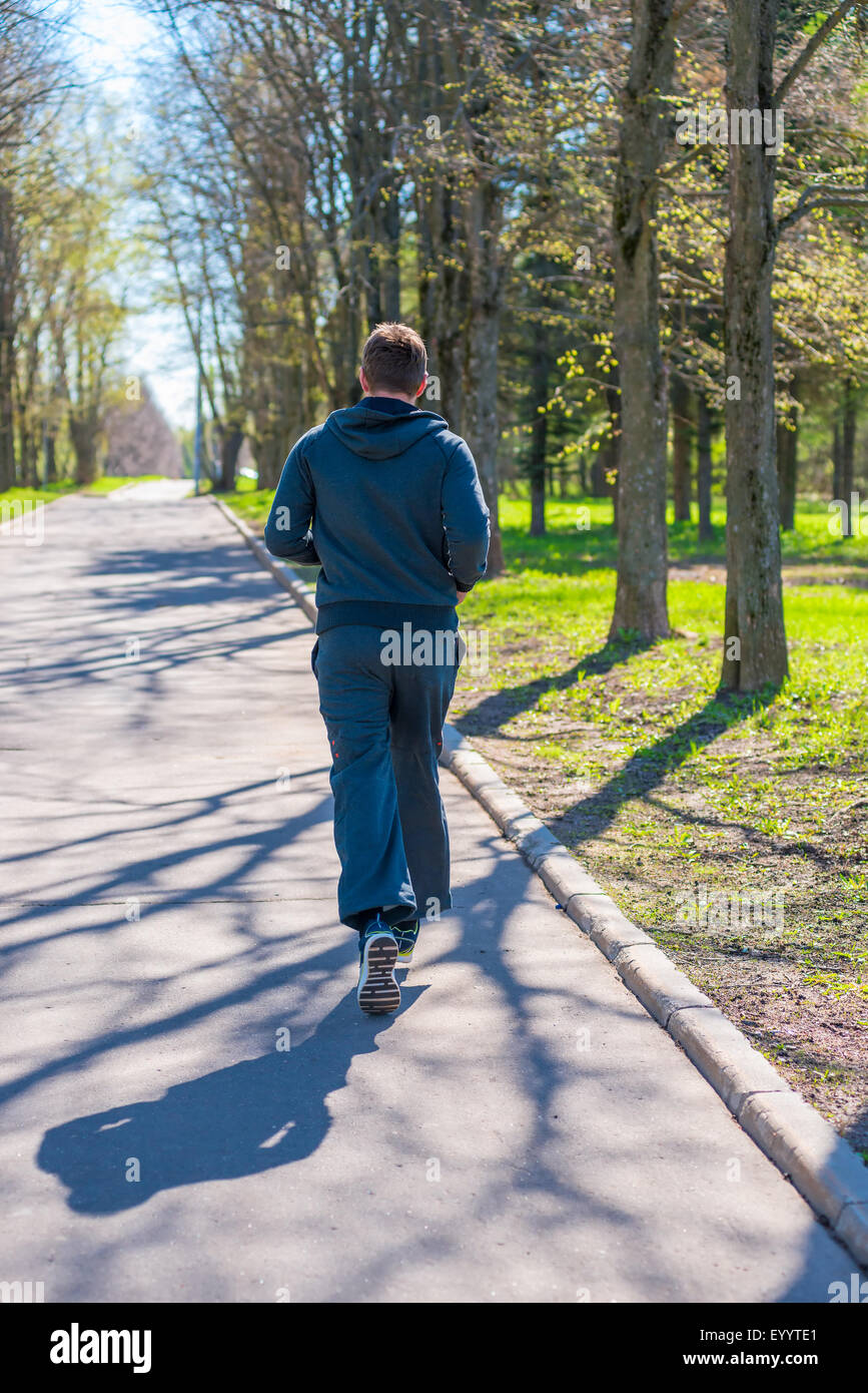 Man in a suit running hi-res stock photography and images - Alamy
