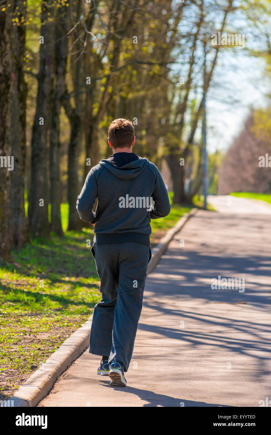 Back view running man in hi-res stock photography and images - Alamy