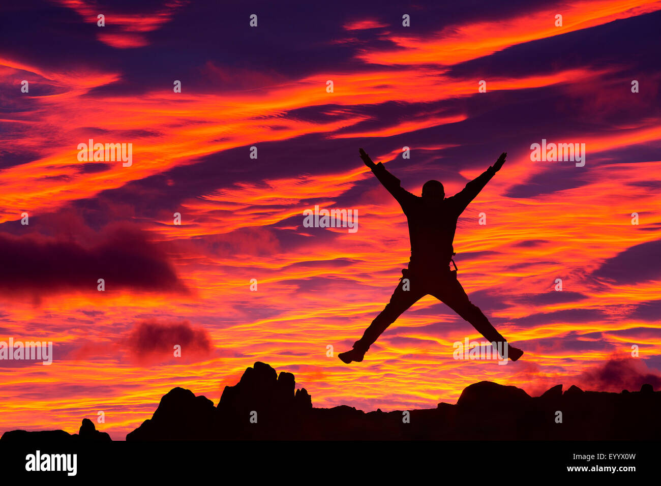 Silhouette jumping man sunset hi-res stock photography and images - Alamy