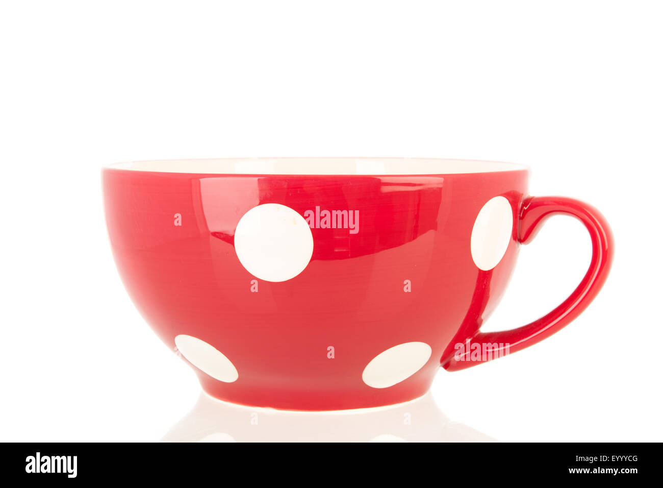 Big red cup with white dots isolated over white background Stock Photo ...