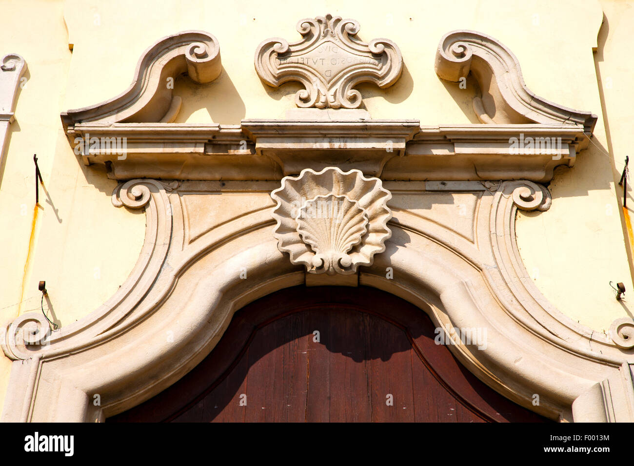 church door in italy lombardy column the milano old closed brick Stock ...