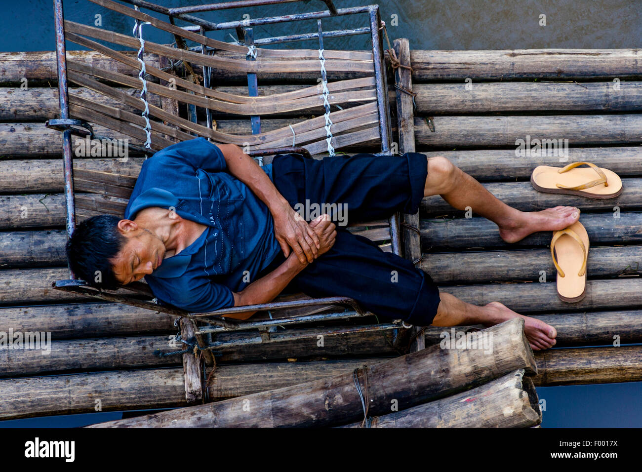 Chinese Man Sleeping On A Raft, Li River, Yangshuo, Guangxi Province ...