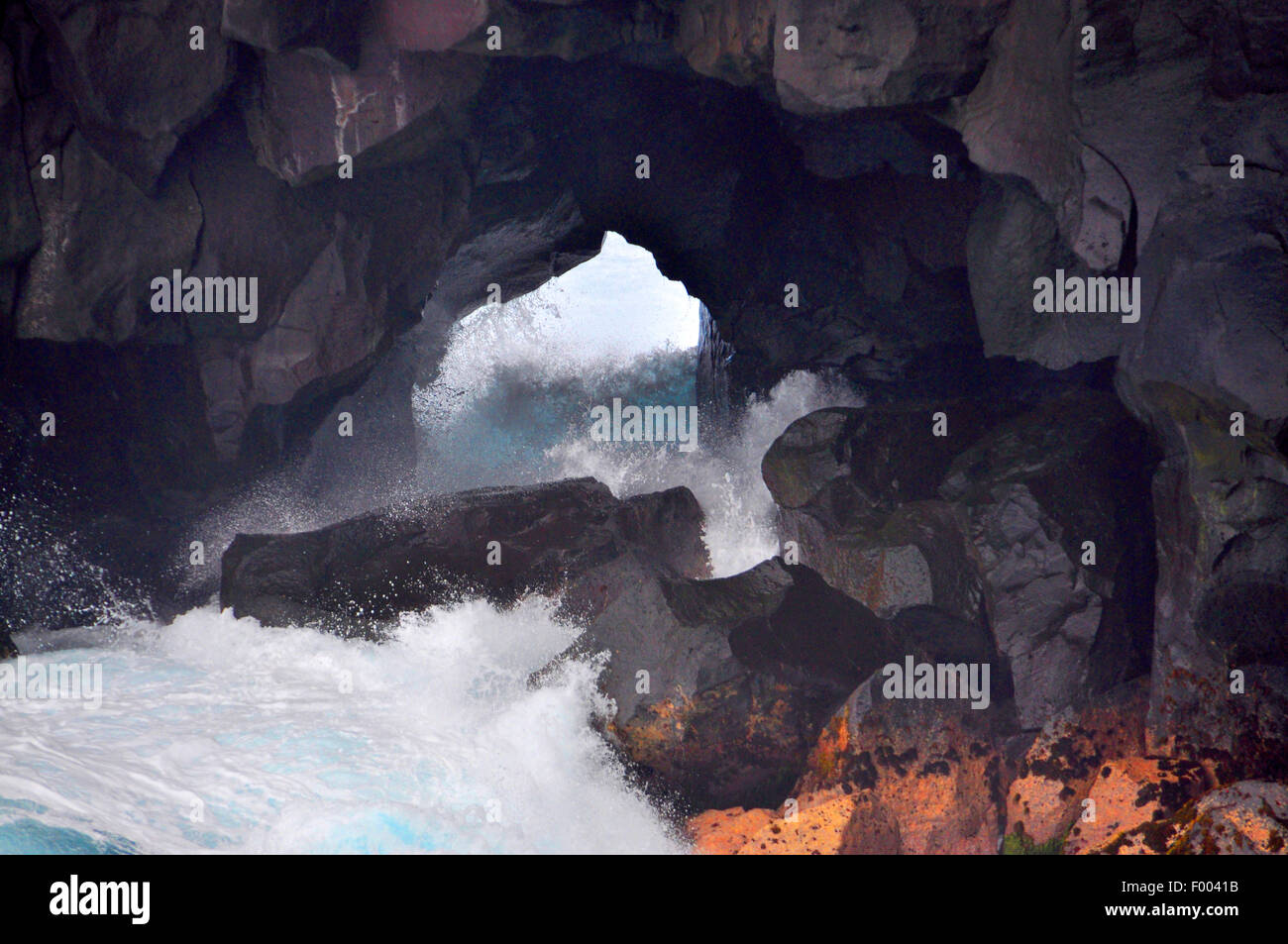 rocky coast with rock window at Cap Mechant, Reunion Stock Photo - Alamy