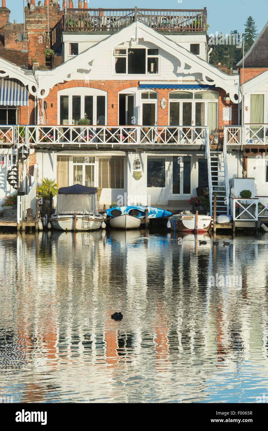 Henley on Thames riverside houses in the early morning sunlight ...