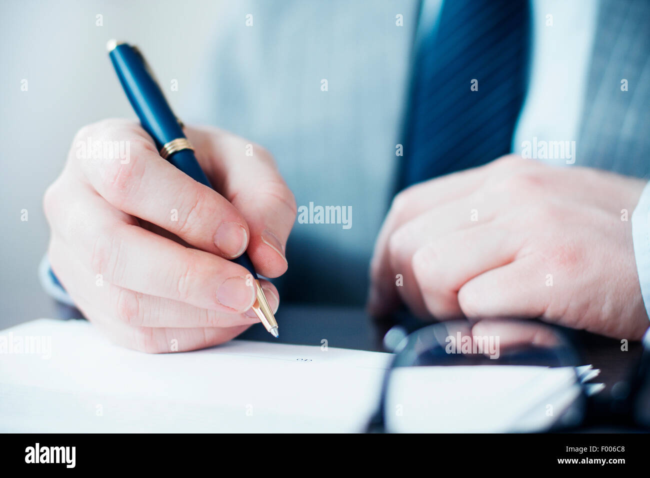 Signing Agreement Close up Stock Photo - Alamy