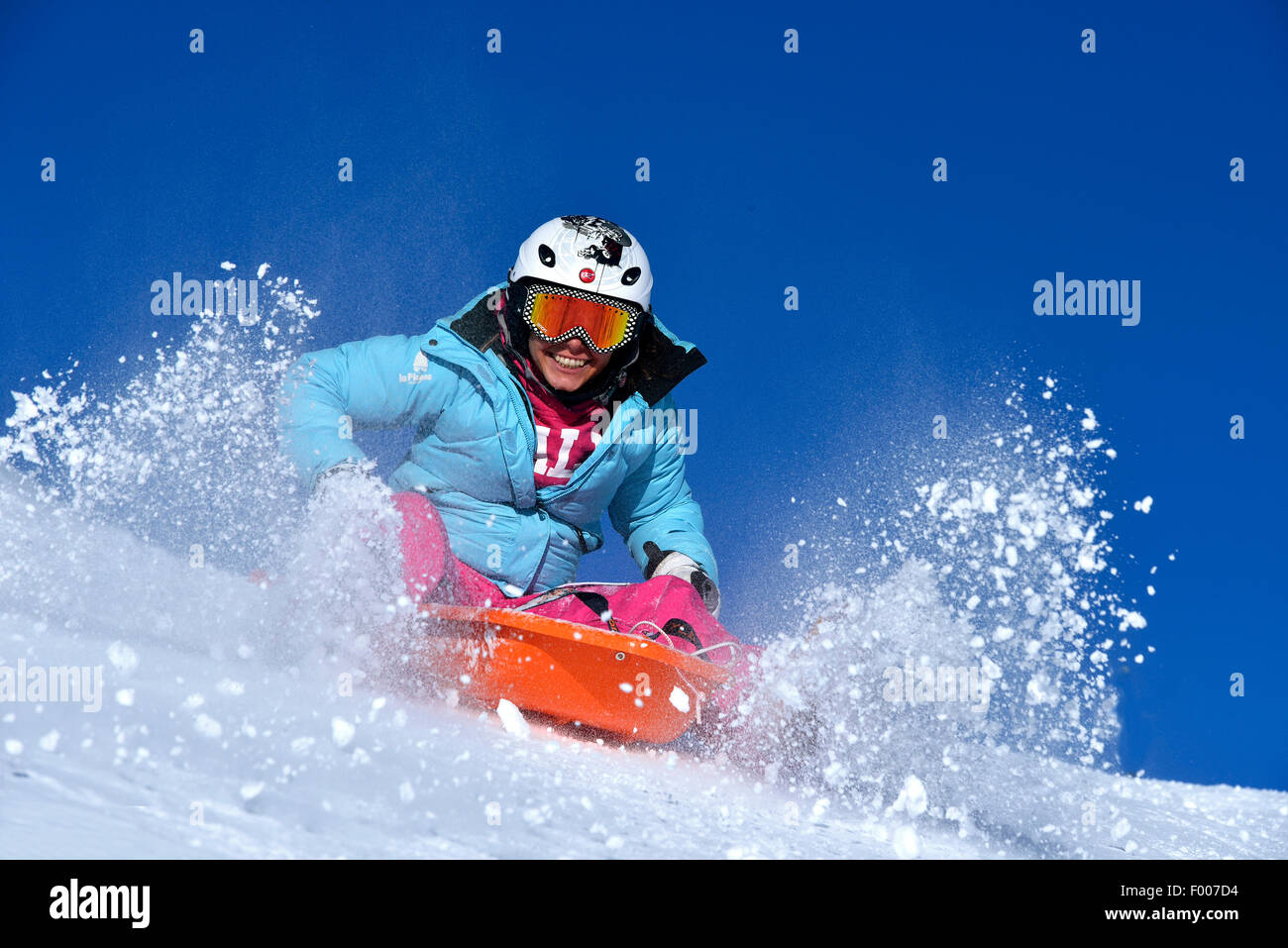 Teens sledging hi-res stock photography and images - Alamy