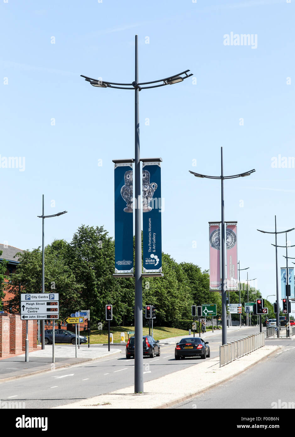 Banners on lamp posts on a road in Stoke on Trent displaying local ...