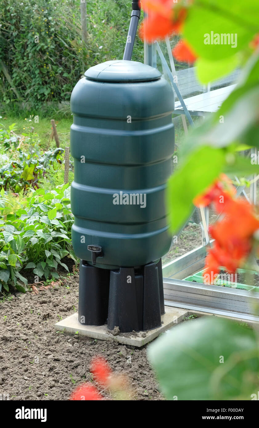 collecting rain water in plastic containers Stock Photo - Alamy