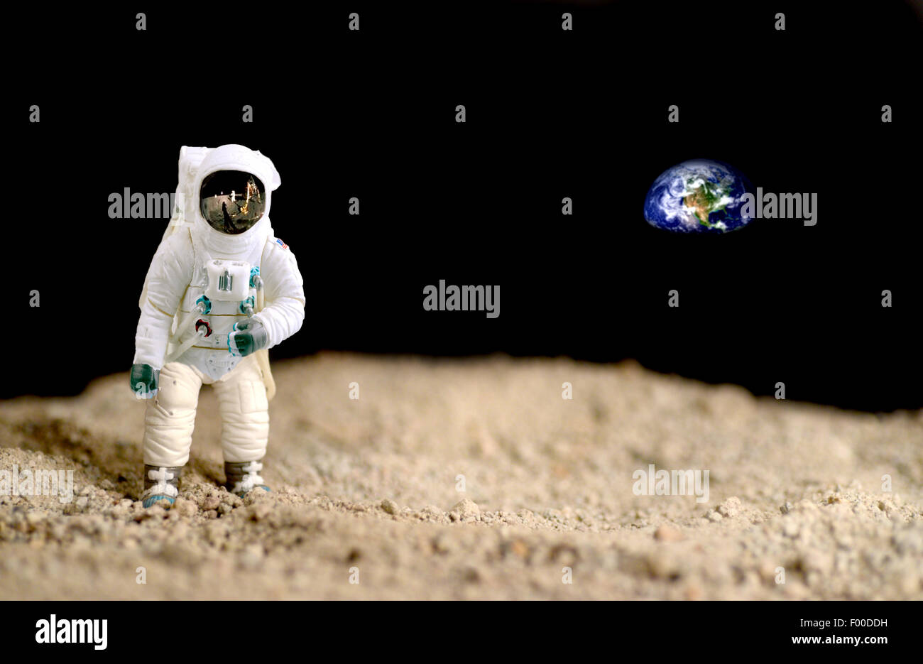 Astronaut on the moon with the earth on the background, elements of ...