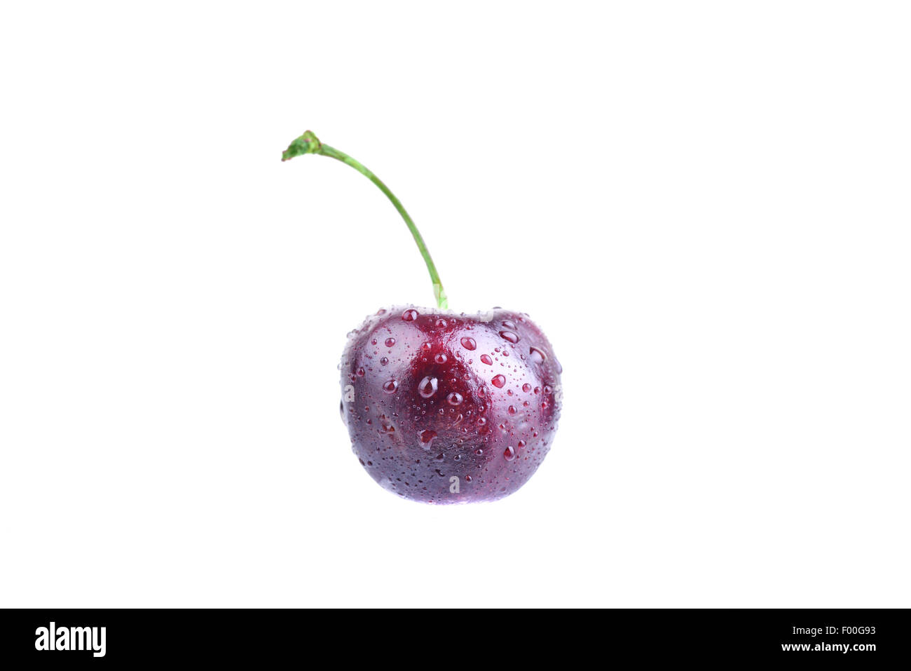 Single cherry with water drops on a white background Stock Photo - Alamy