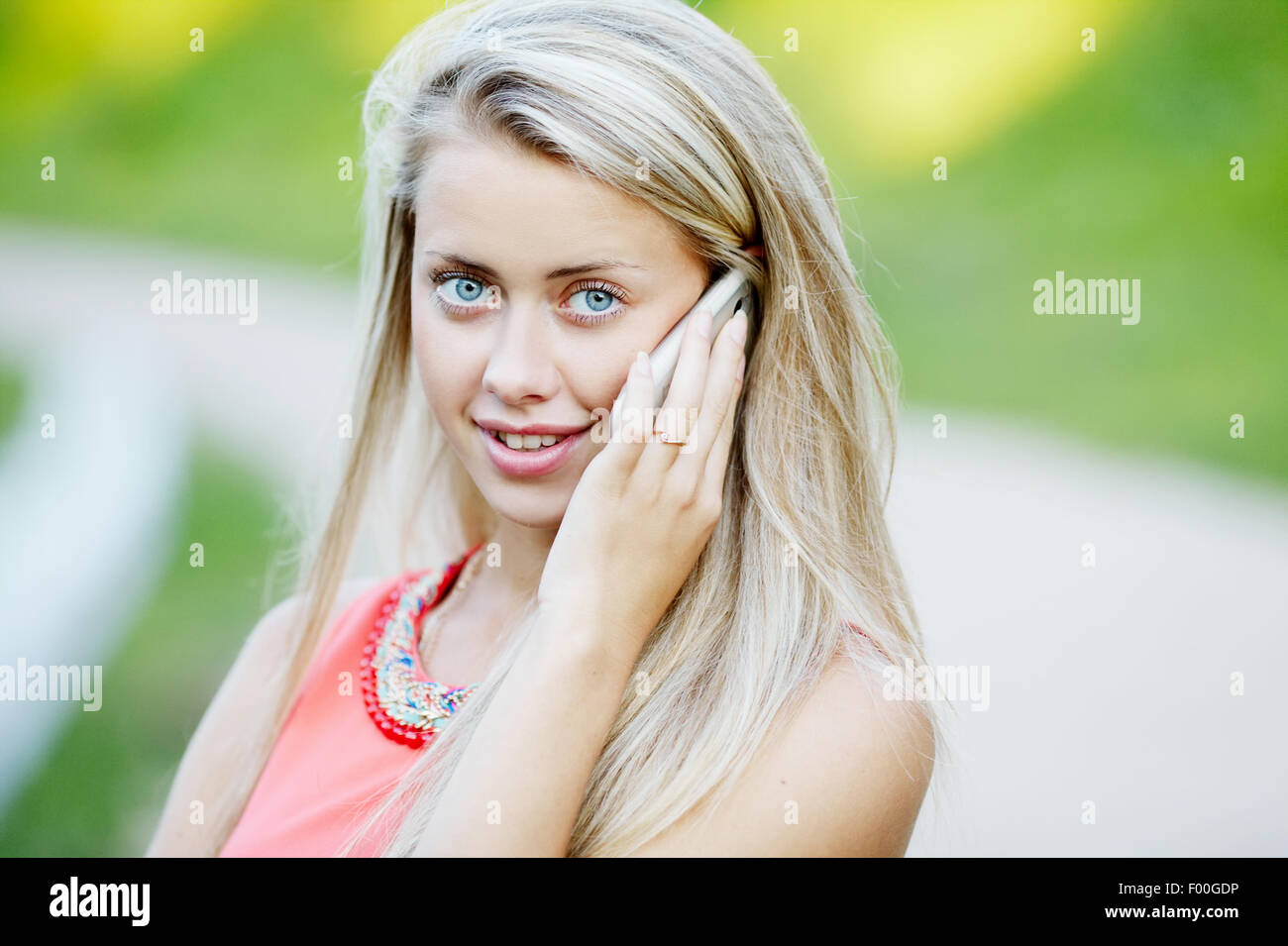 beautiful girl talking mobile phone Stock Photo - Alamy