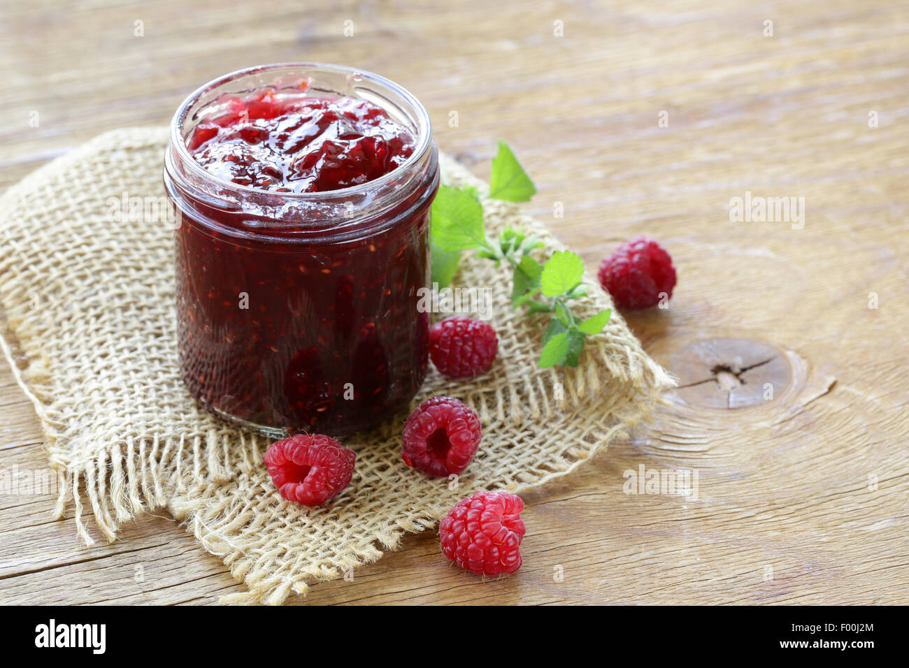 natural organic homemade raspberry jam in a glass jar Stock Photo - Alamy