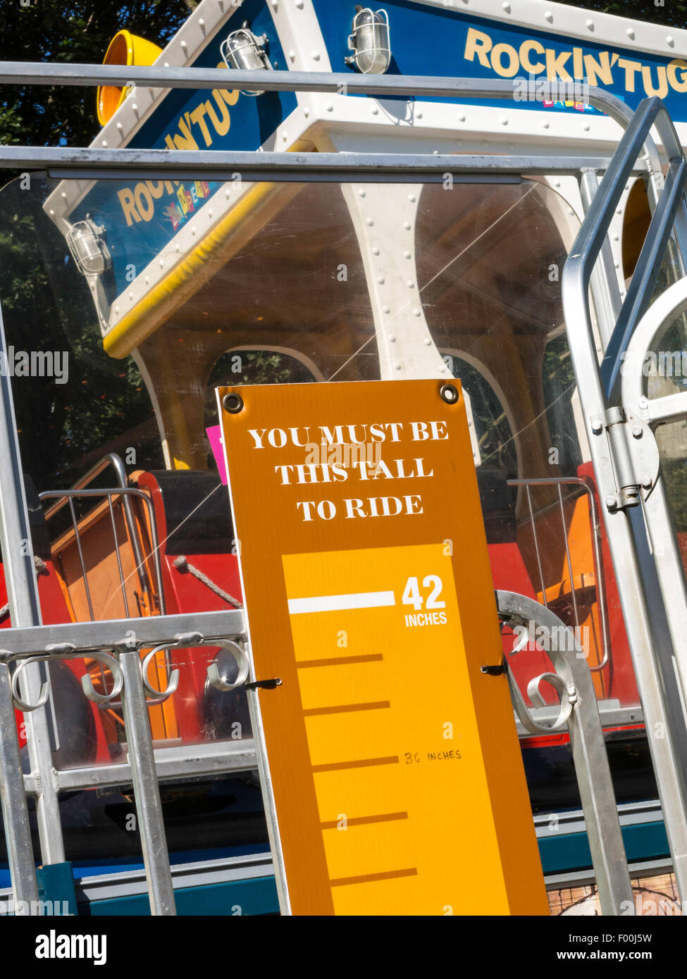 Must be this tall to ride sign hi-res stock photography and images - Alamy