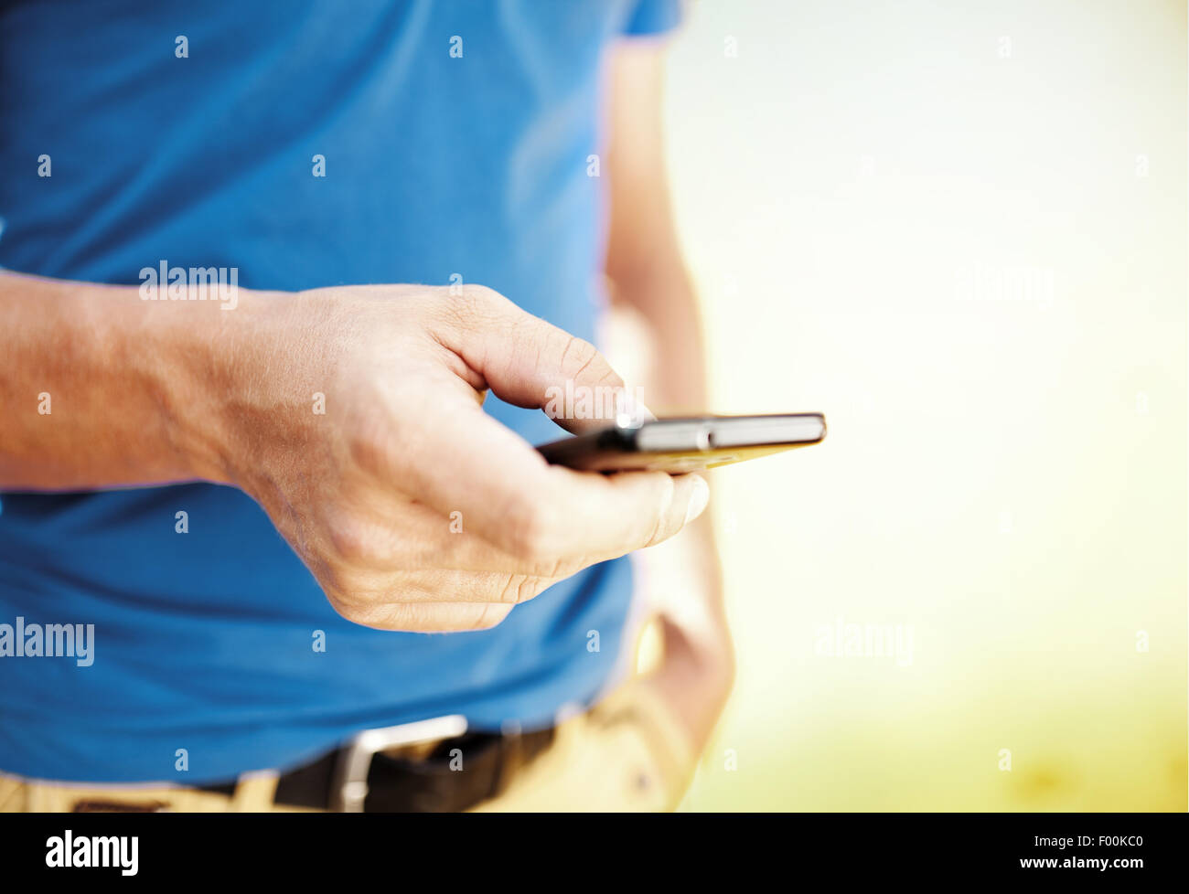 Close up of a man using mobile smart phone Stock Photo - Alamy