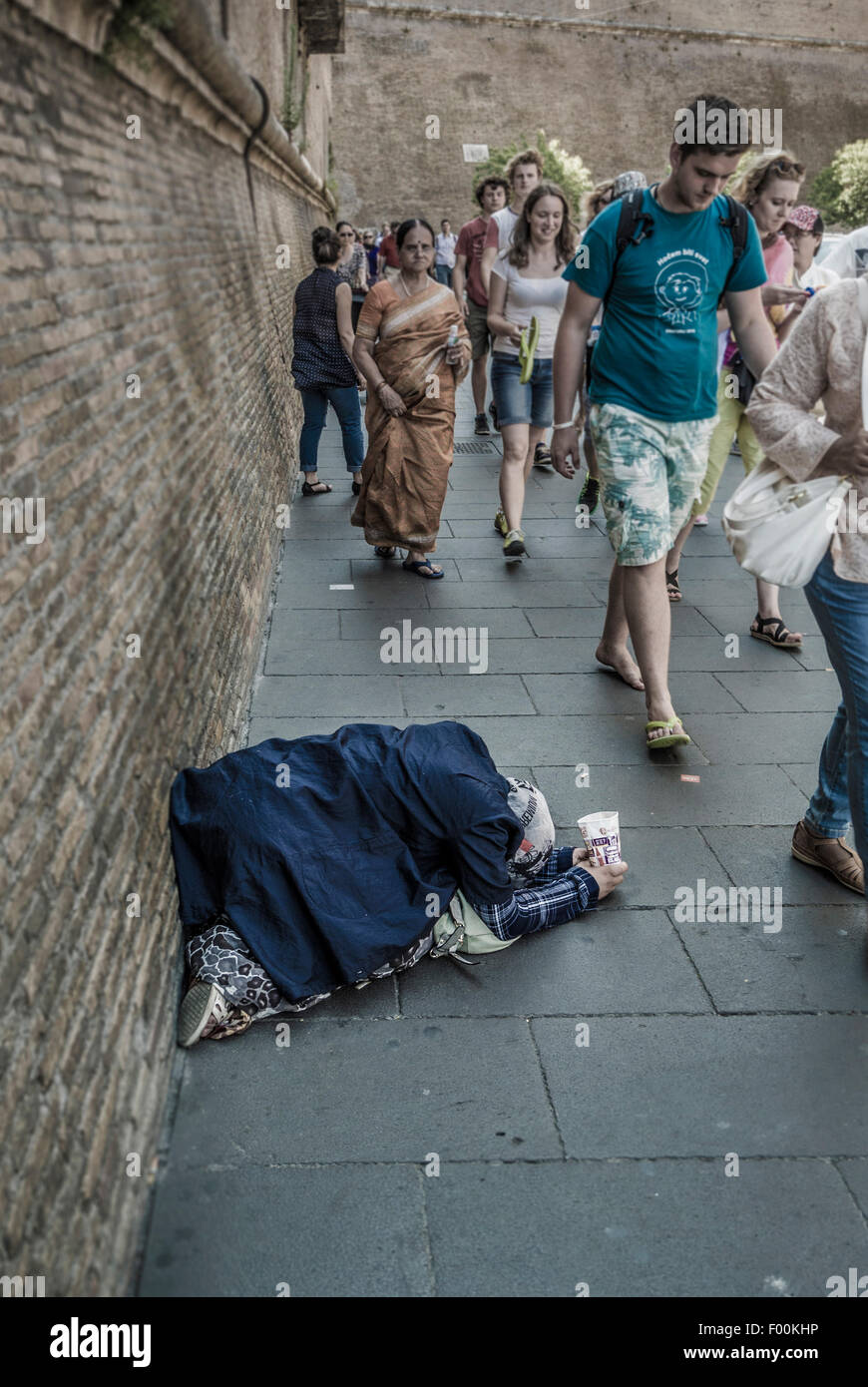 Woman street beggar outside the walls of the Vatican. Rome, Italy Stock ...