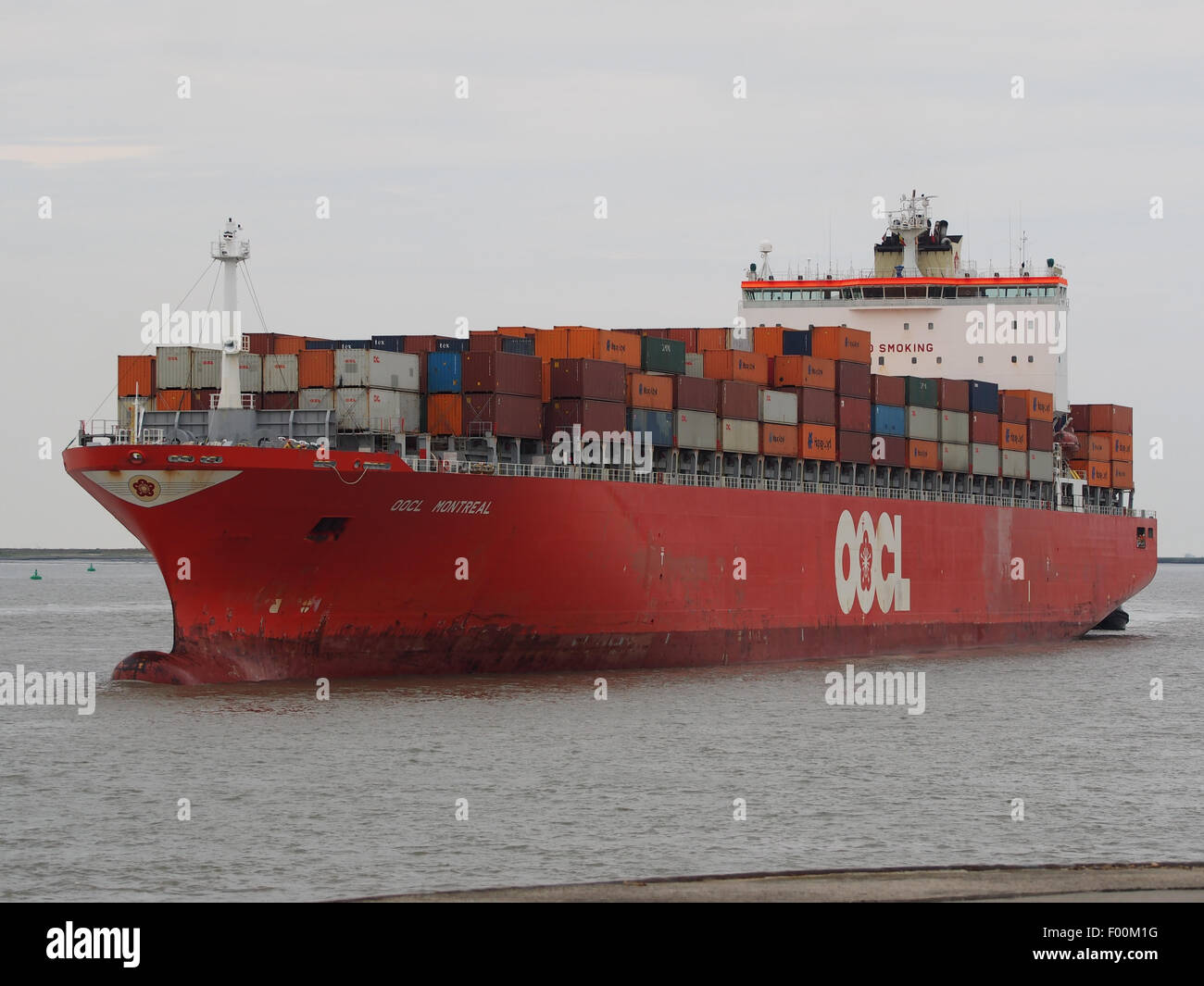 The OOCL Montreal (IMO 9253739, Callsign VRYO3) is docked at the Port ...