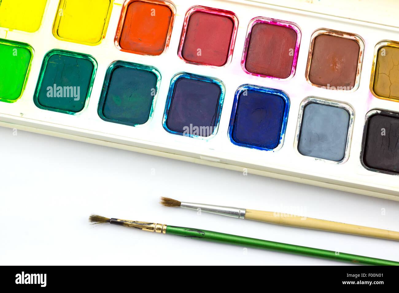 Paint tray and brush on white background Stock Photo - Alamy