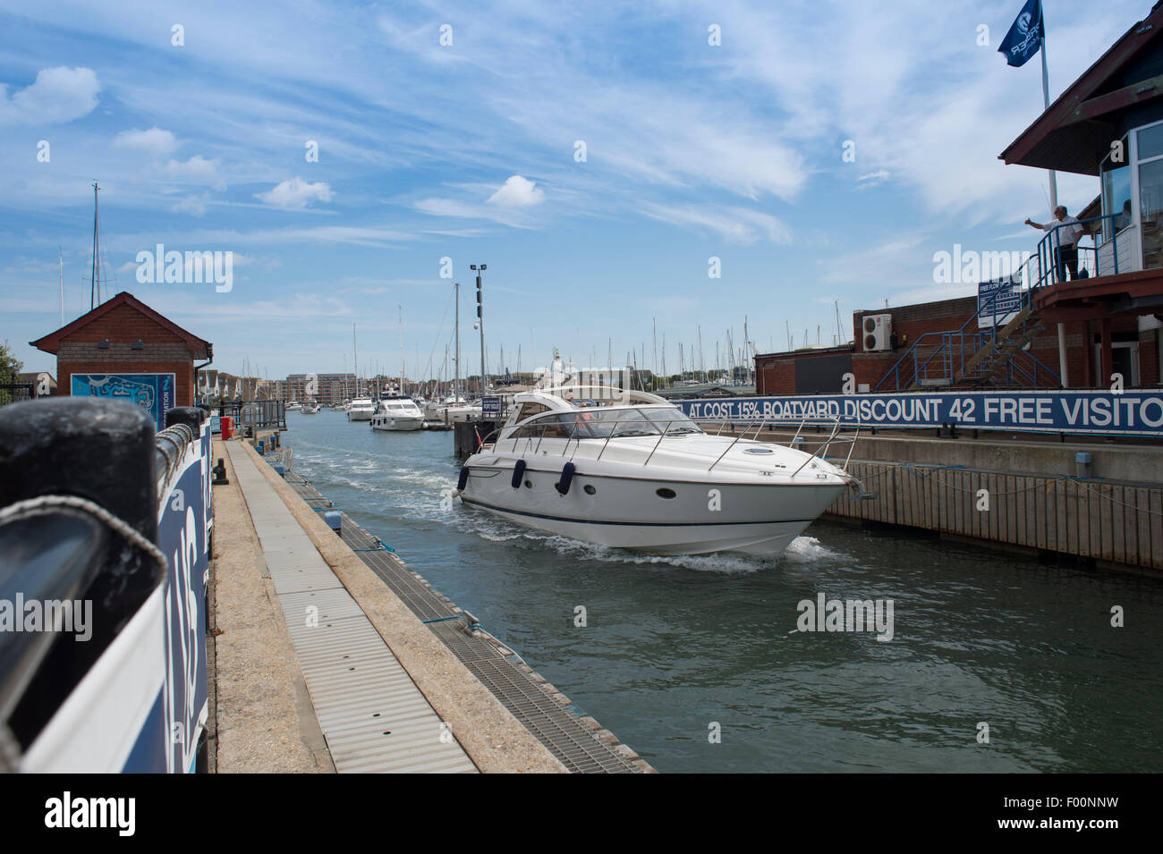 Yacht entering the marina hi-res stock photography and images - Alamy