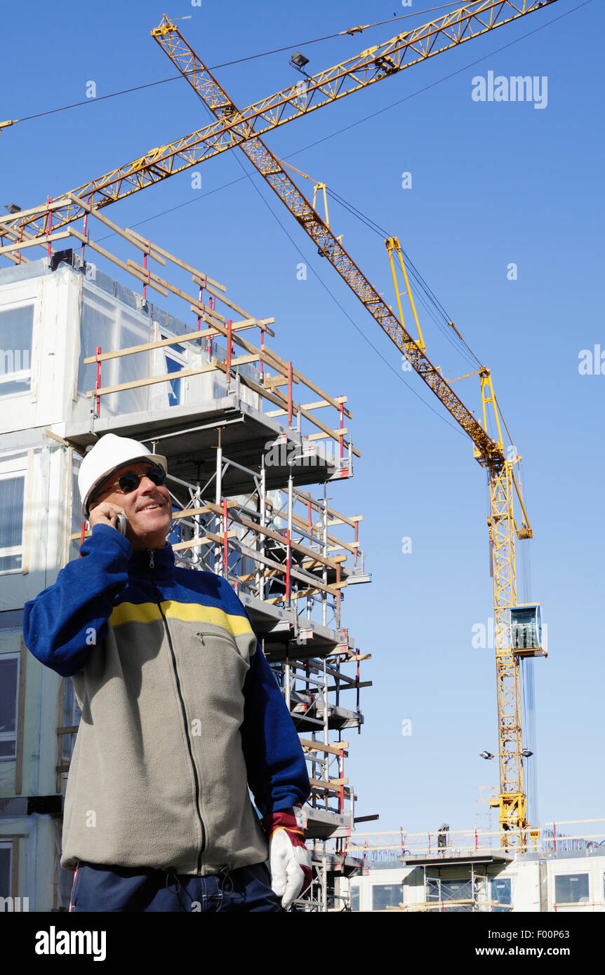 building worker inside construction site Stock Photo - Alamy