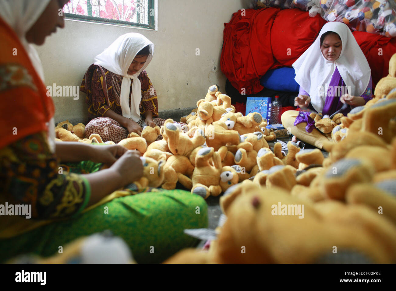 Dhaka, Bangladesh. 5th Aug, 2015. Bangladeshi workers make toys at a small factory in Dhaka ...