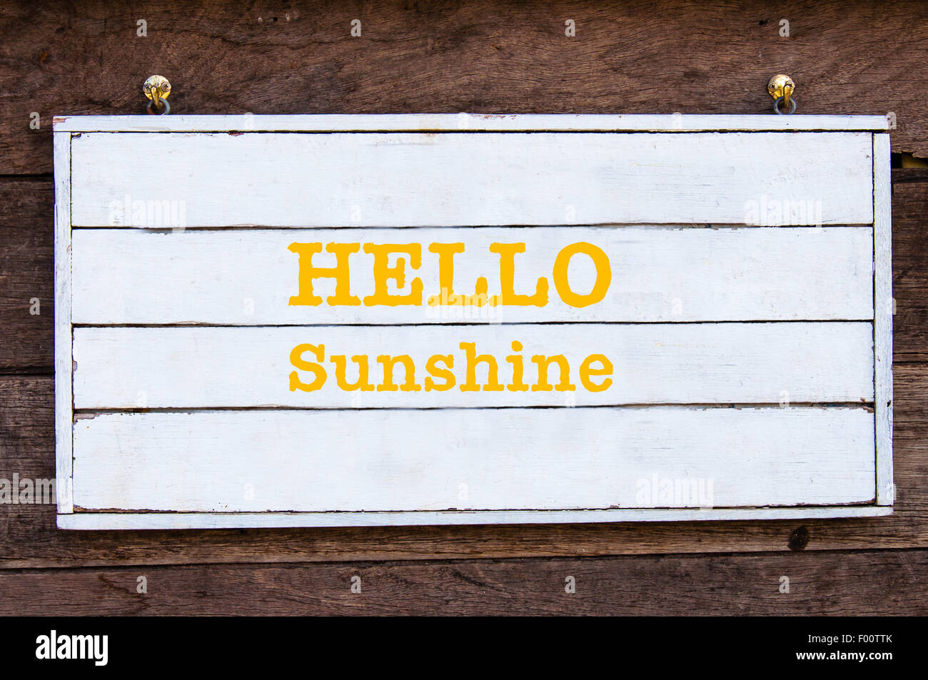 Hello Sunshine message written on vintage wooden board. Motivational ...