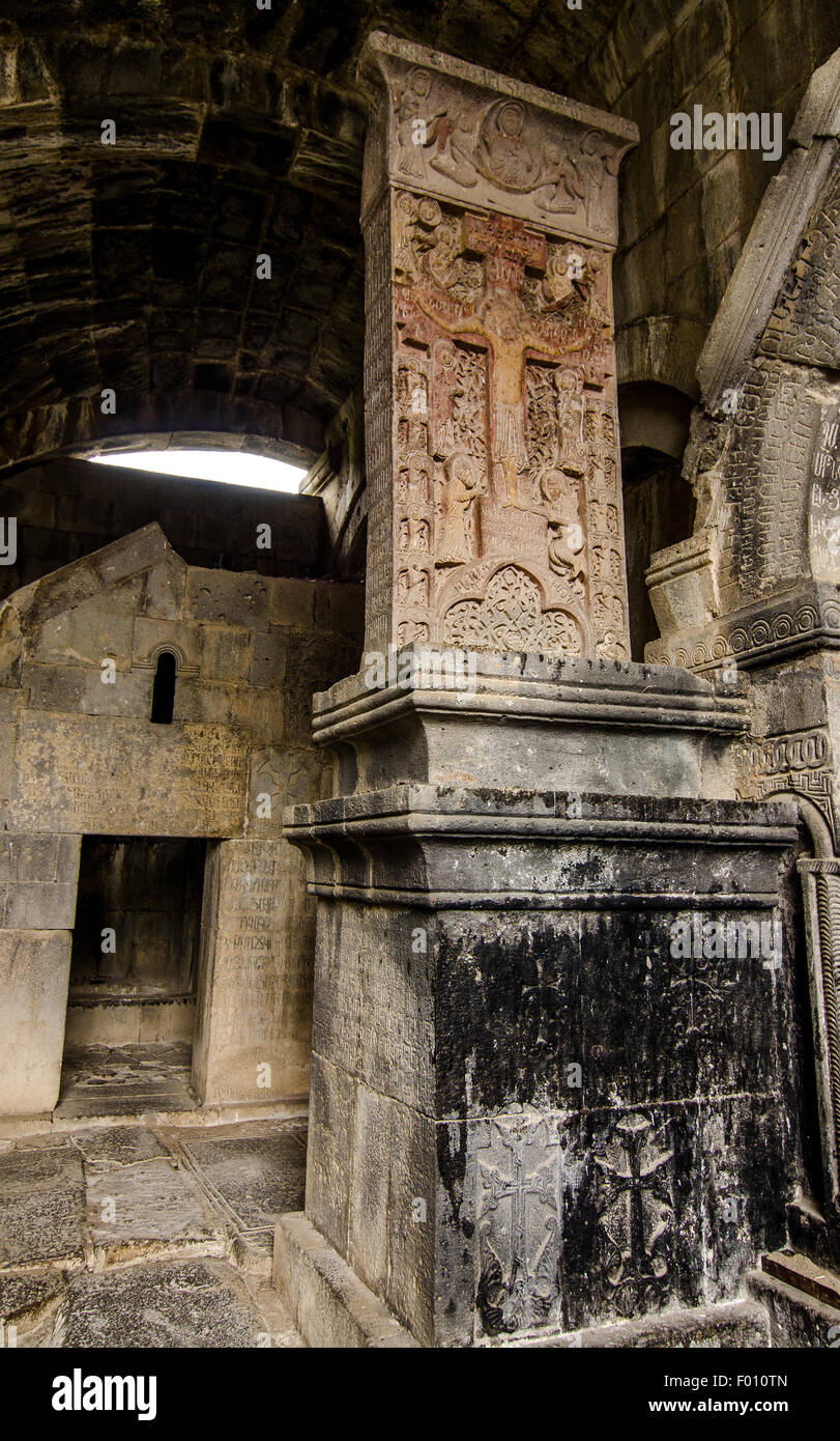 Ancient stone tombs arranged in a historic site under bright sunlight ...