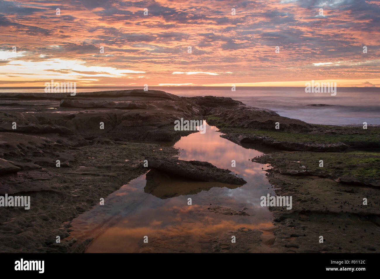 Colorful sunset on the beach. Similajau National Park, Sarawak ...